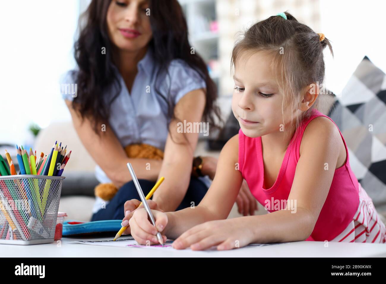 Child holding pencil Stock Photo - Alamy