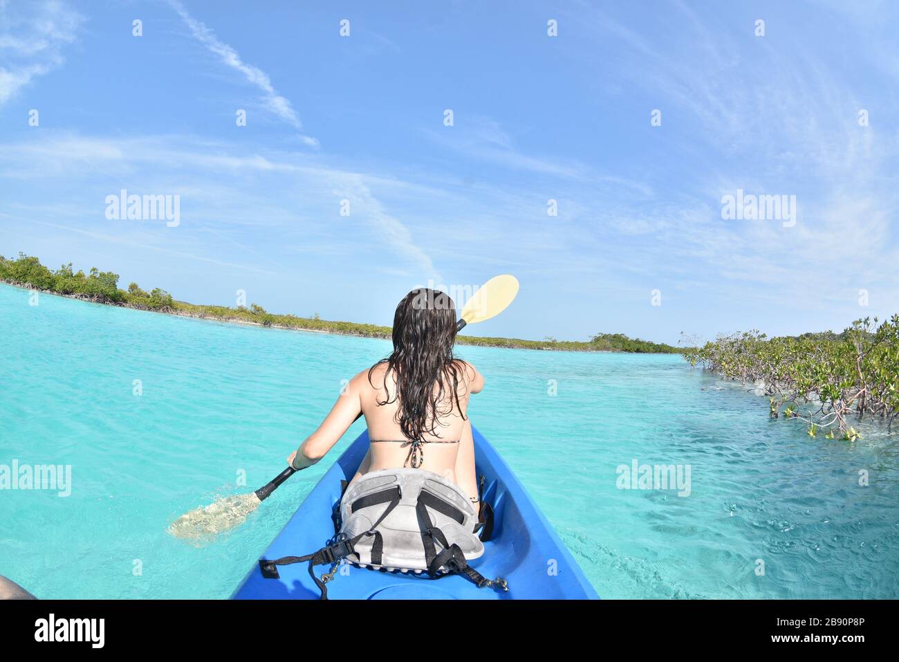 Kayaking in Caribbean waters with blue sky Stock Photo - Alamy