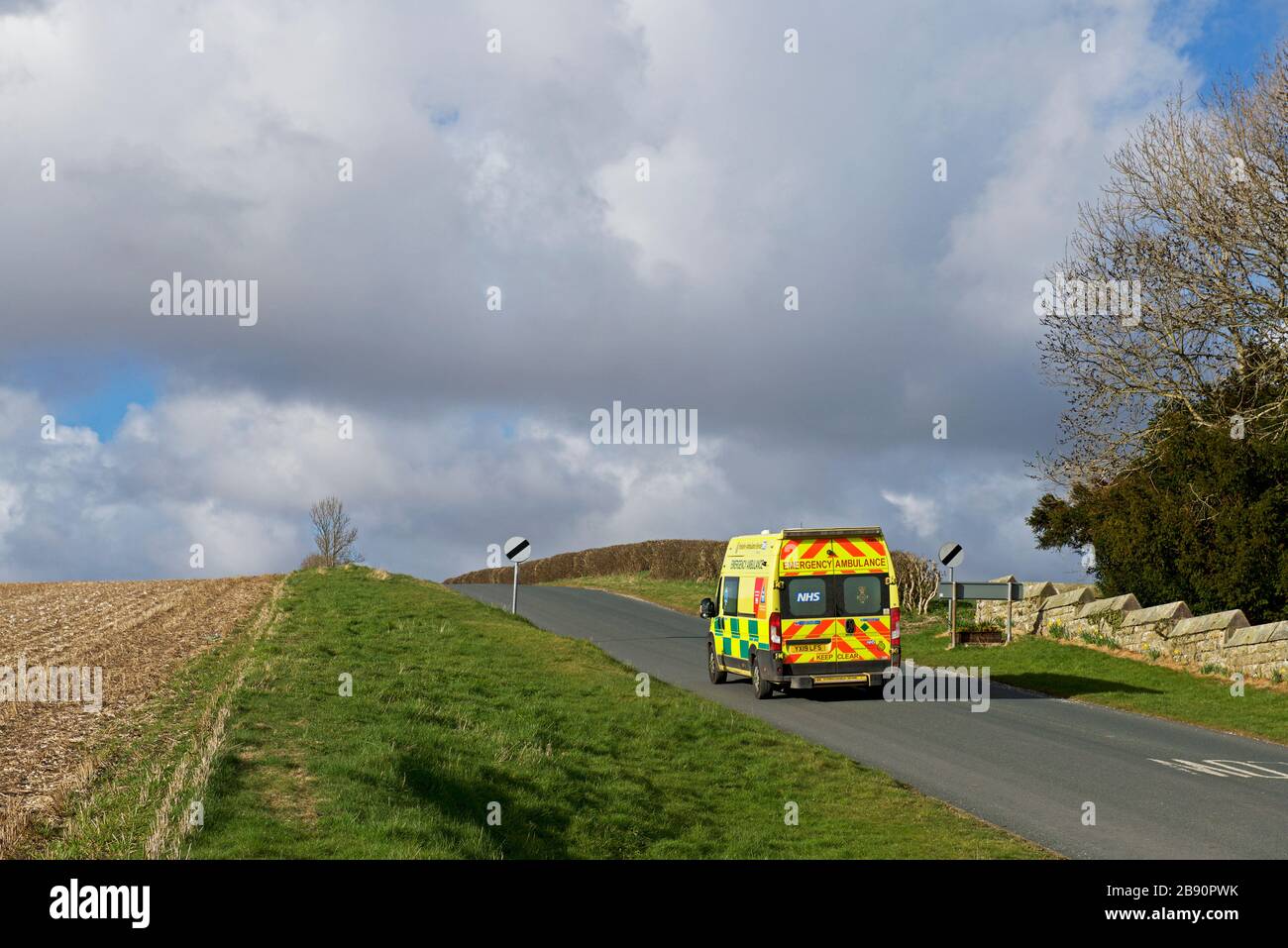 Ambulance on country road, England UK Stock Photo - Alamy