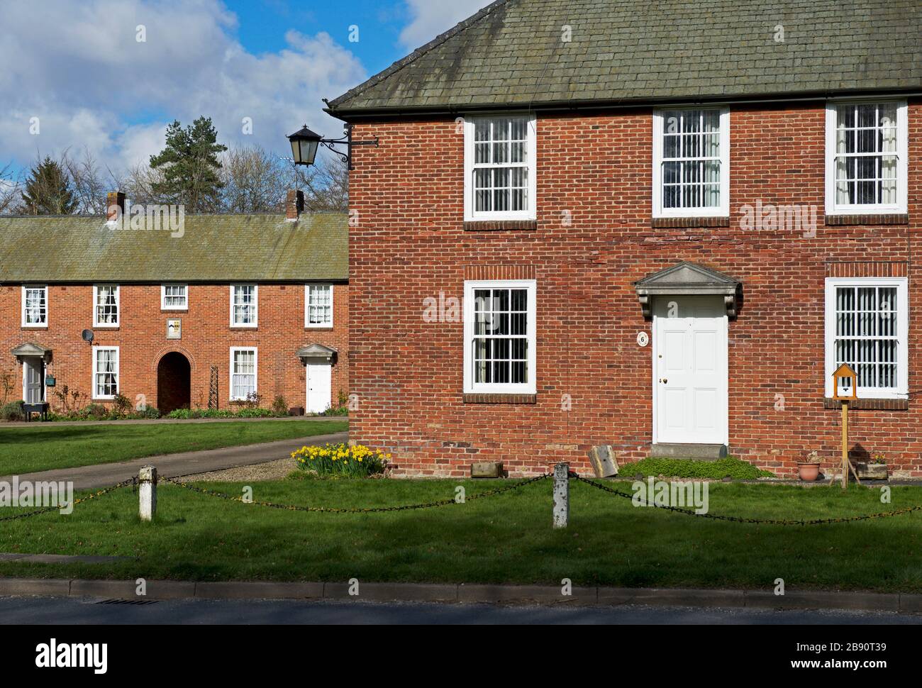 Houses in the estate village of Sledmere, East Yorkshire, England UK ...