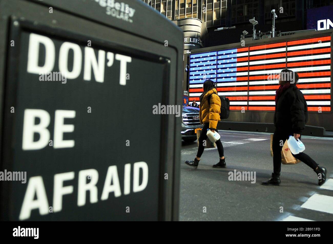 People wander through Time Square on in New York City. (Photo by Luiz ...