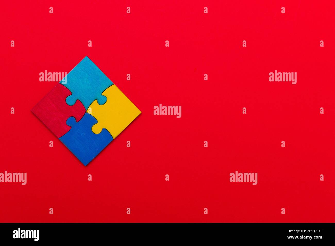 World Autism Awareness, concept with puzzle or jigsaw pattern on red ...