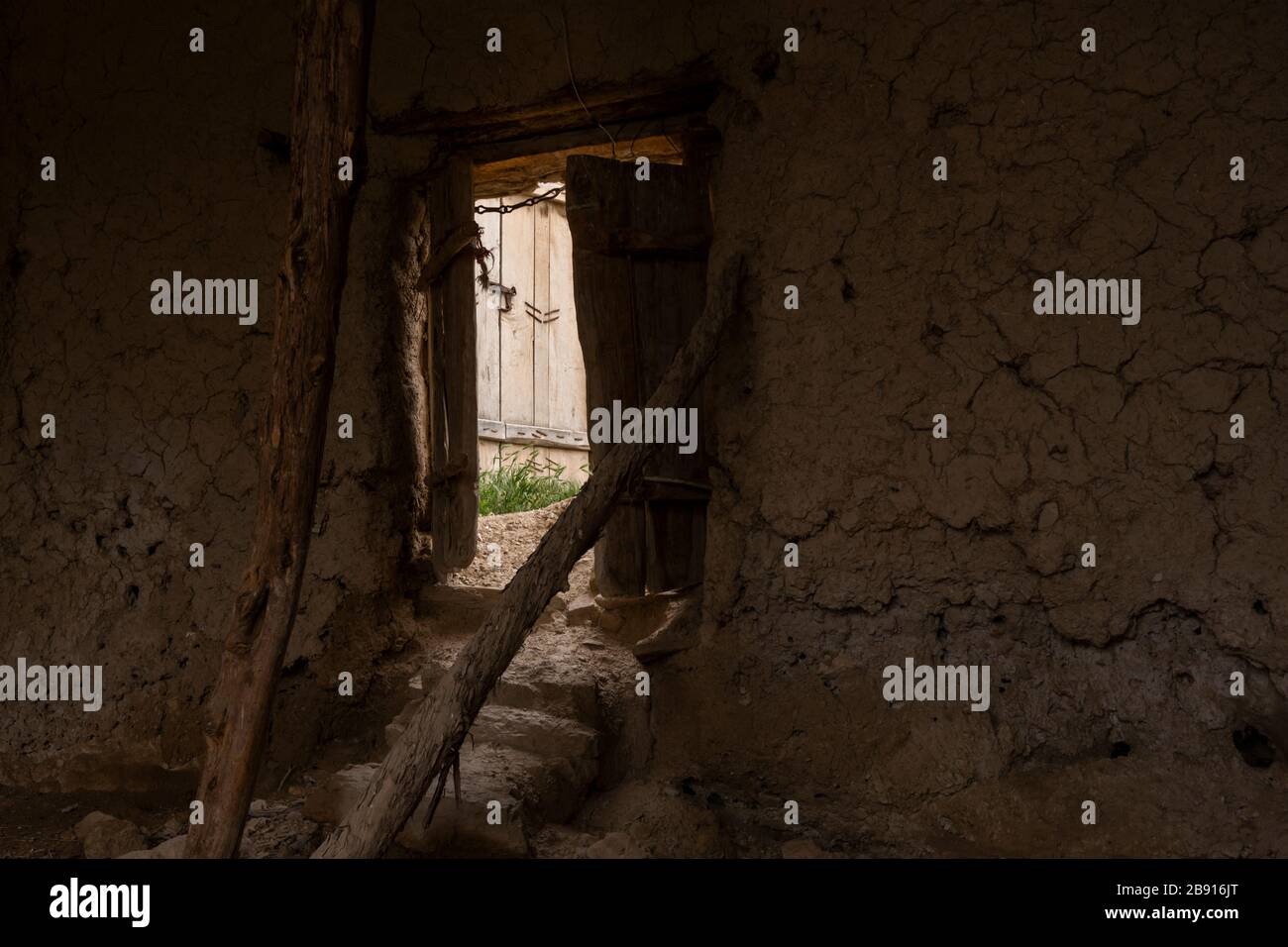 Abandoned clay house in Aspakhu in Iran with collapsed door Stock Photo ...