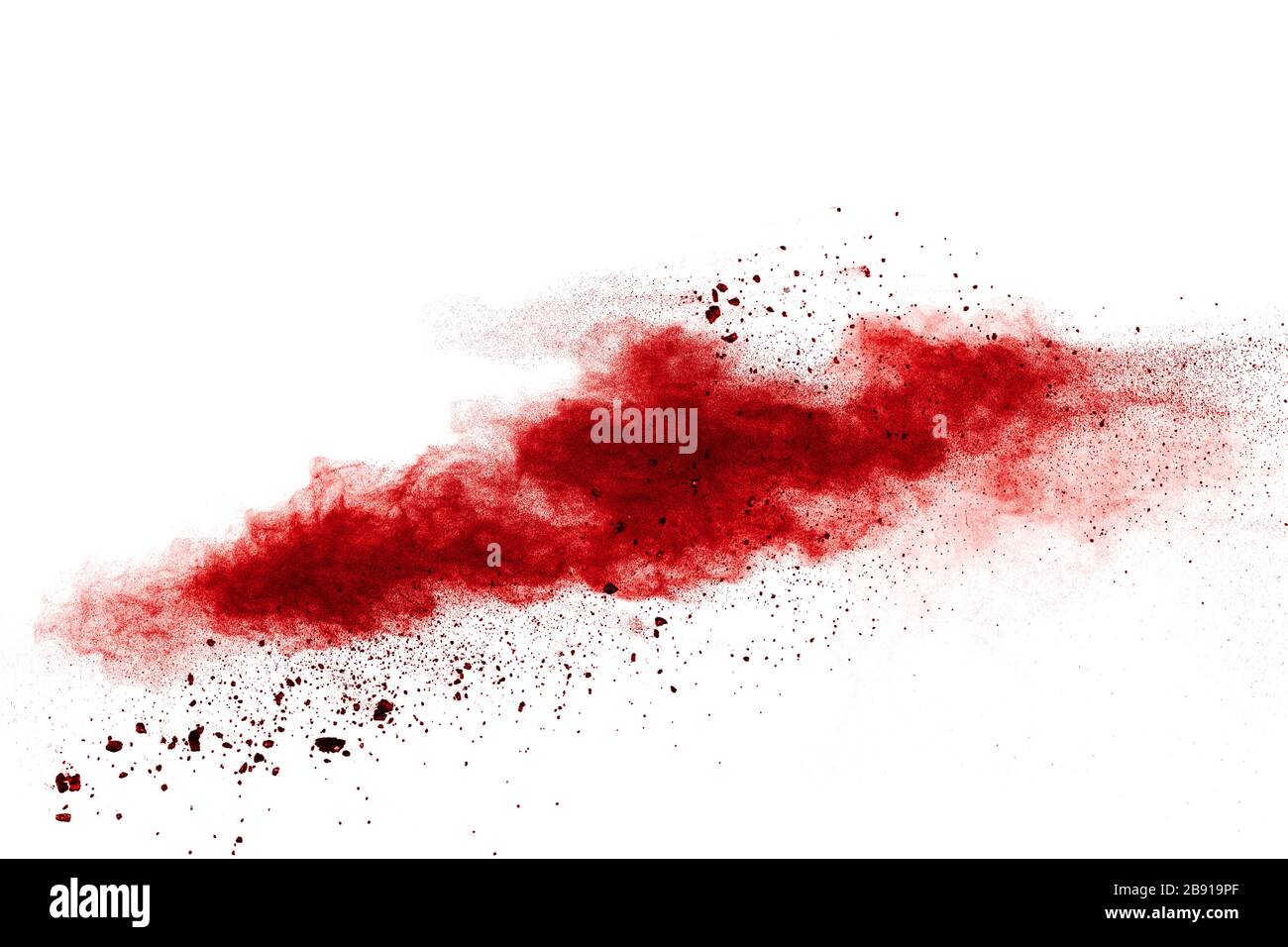 Red powder explosion cloud on white background. Freeze motion of red ...