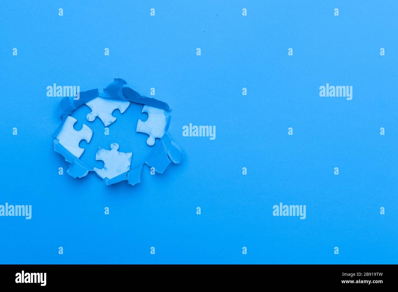 World Autism Awareness, concept with puzzle or jigsaw pattern in paper ...