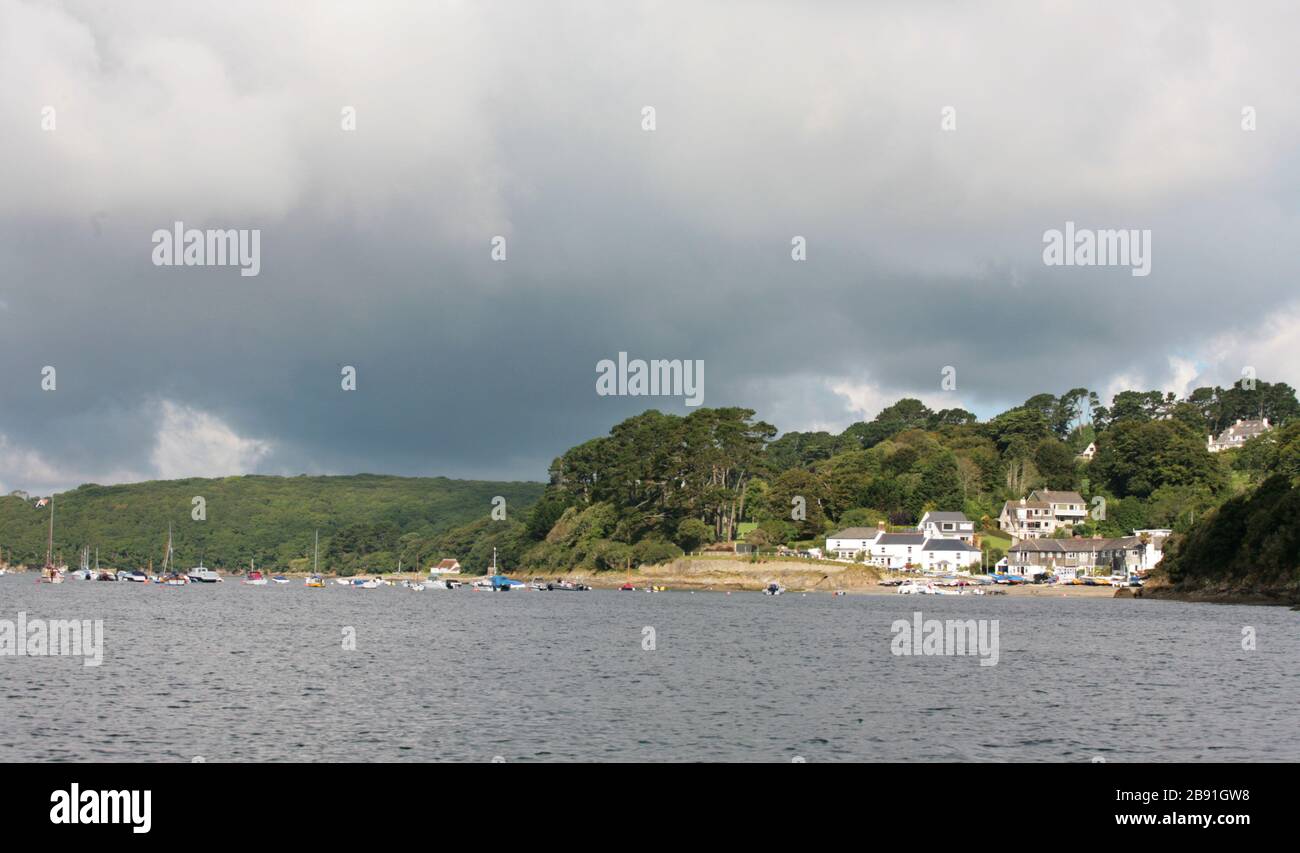 A quiet reach of the Helford River by Helford Passage looking upstream ...