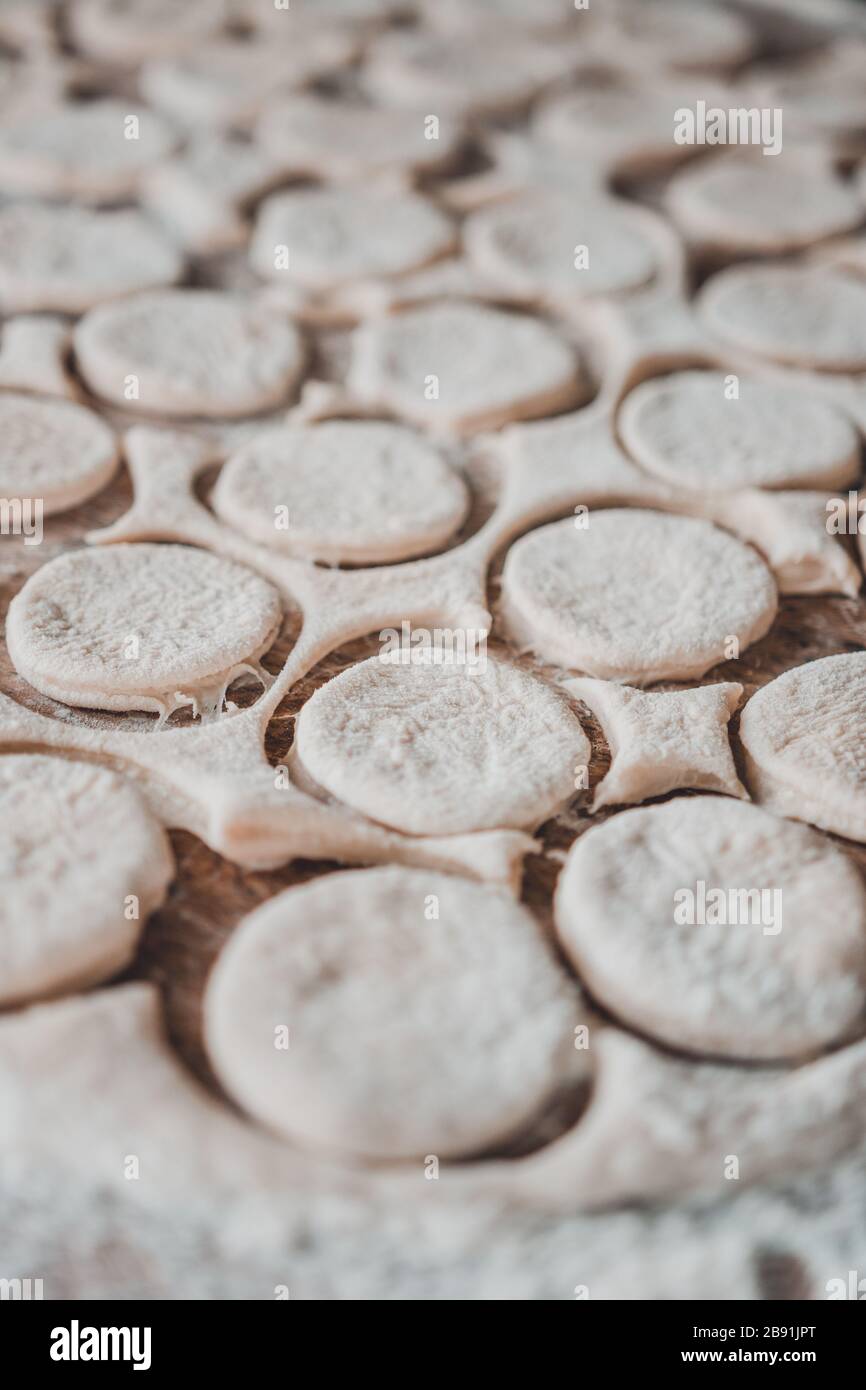 Cut circles for dumplings, texture from the dough.2020 Stock Photo - Alamy