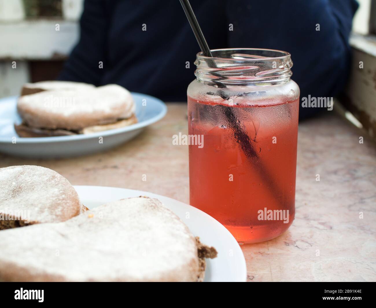 Pink iced tea served in a jar Stock Photo - Alamy