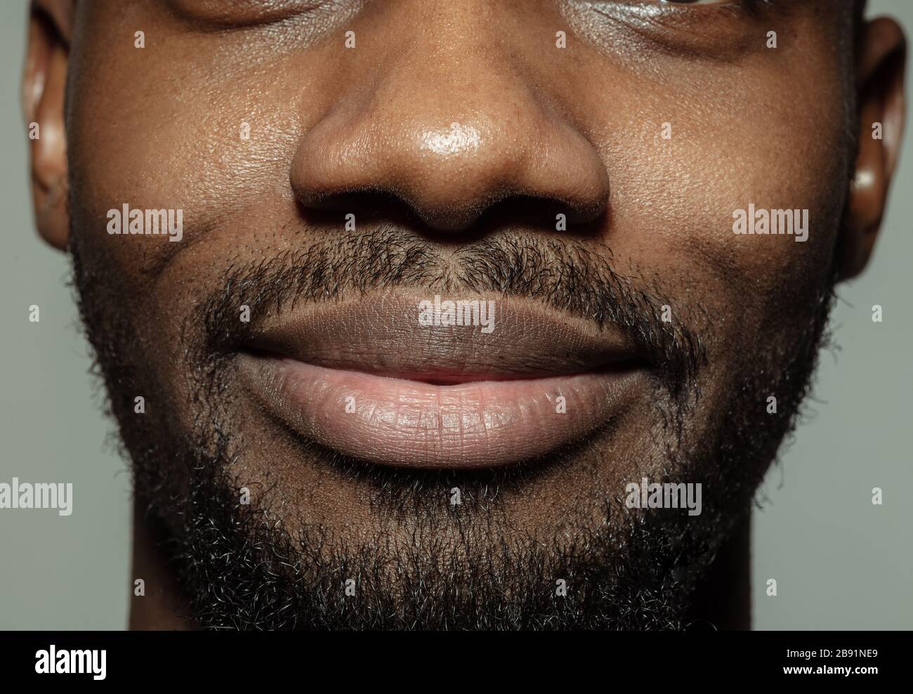 Delighted, calm. Close up of face of beautiful african-american young ...