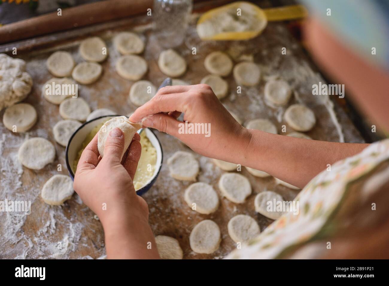 Woman prepares traditional meal hi-res stock photography and images - Alamy