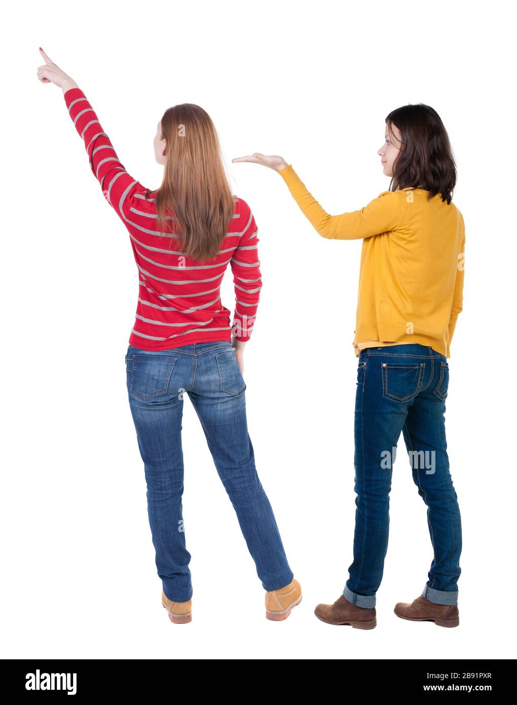 Back view of two pointing girl in sweater. Rear view people collection ...