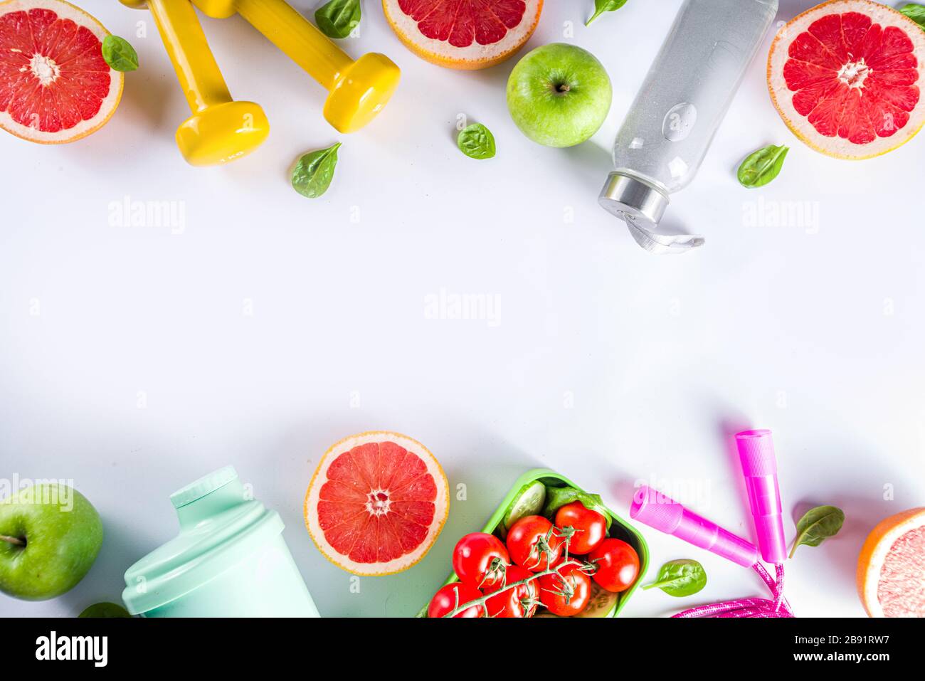 Fitness and healthy food lifestyle concept. Dumbbells, diet fruit and ...