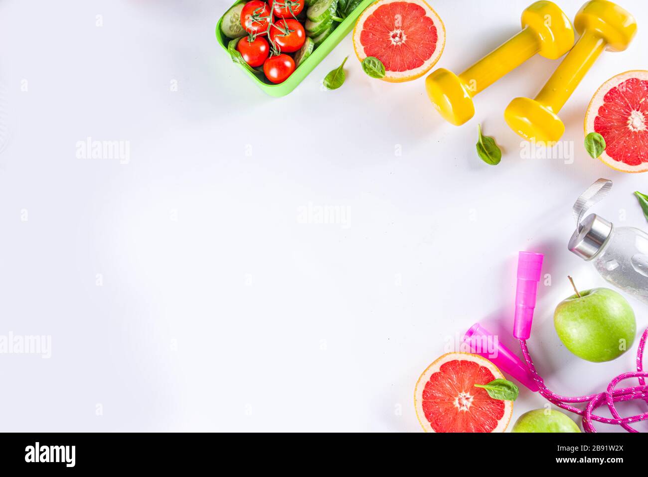 Fitness and healthy food lifestyle concept. Dumbbells, diet fruit and ...