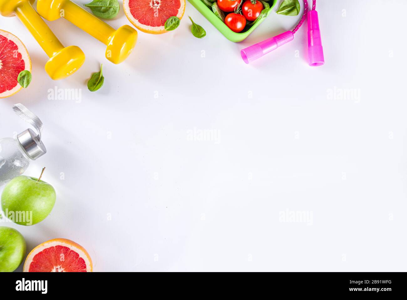 Fitness and healthy food lifestyle concept. Dumbbells, diet fruit and ...