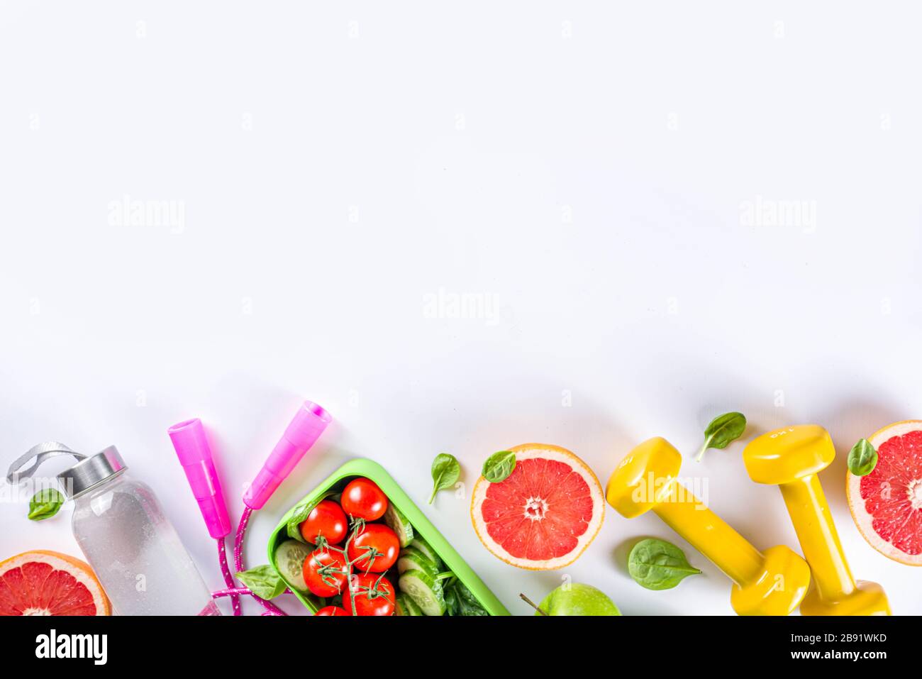 Fitness and healthy food lifestyle concept. Dumbbells, diet fruit and ...