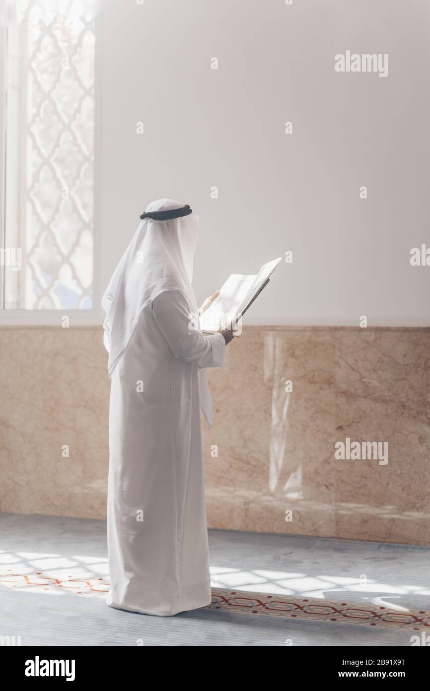 Quran - holy book of Islam mosque Muslim in mosque enuntiat Quran in ...