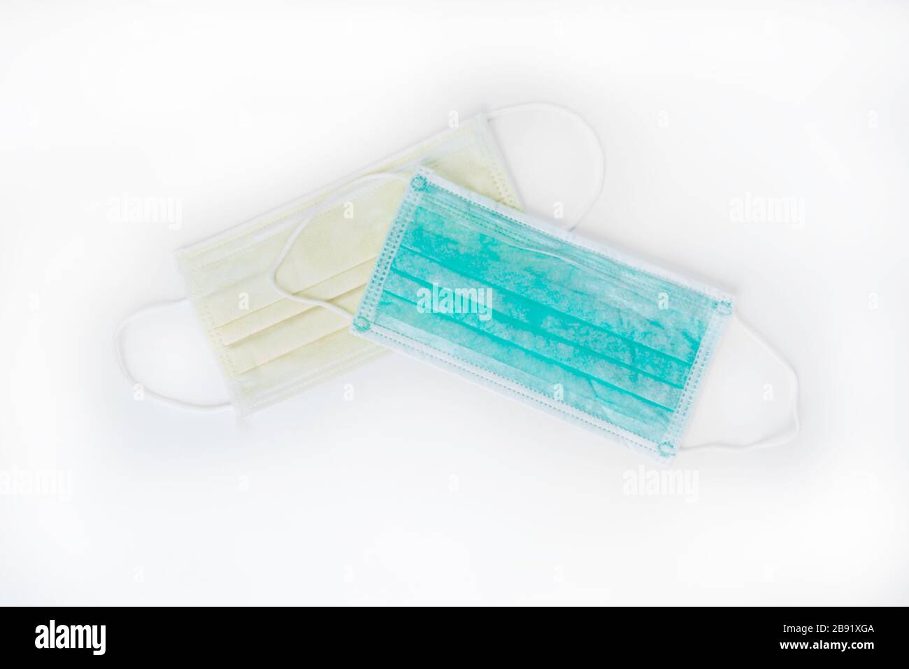 two medical surgical flu ilness protective face masks, help reduce the ...