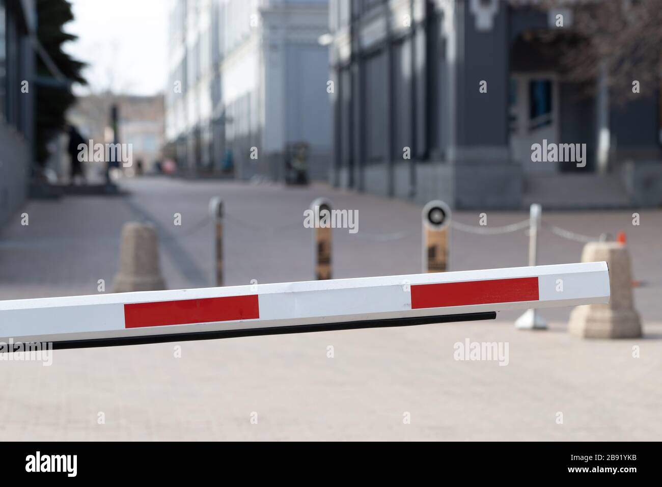 Automatic security metal barrier boom closed for stop and checking car ...