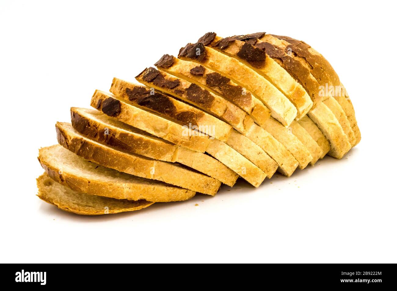 Homemade bread cut into slices on a white background Stock Photo - Alamy