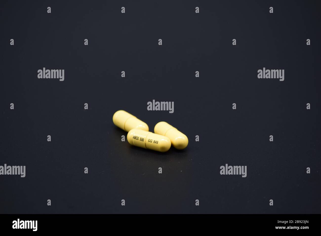 Close Up Of Antibiotic/Amoxicillin Pills Against Black Background Stock ...