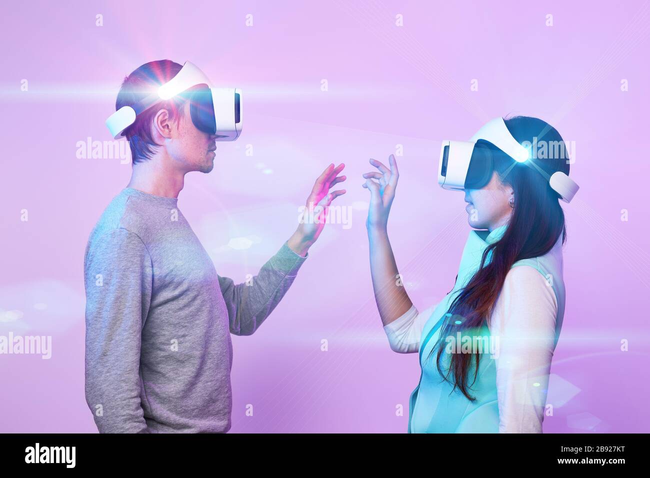 Couple in love communicate using a virtual reality headset. Concept of ...