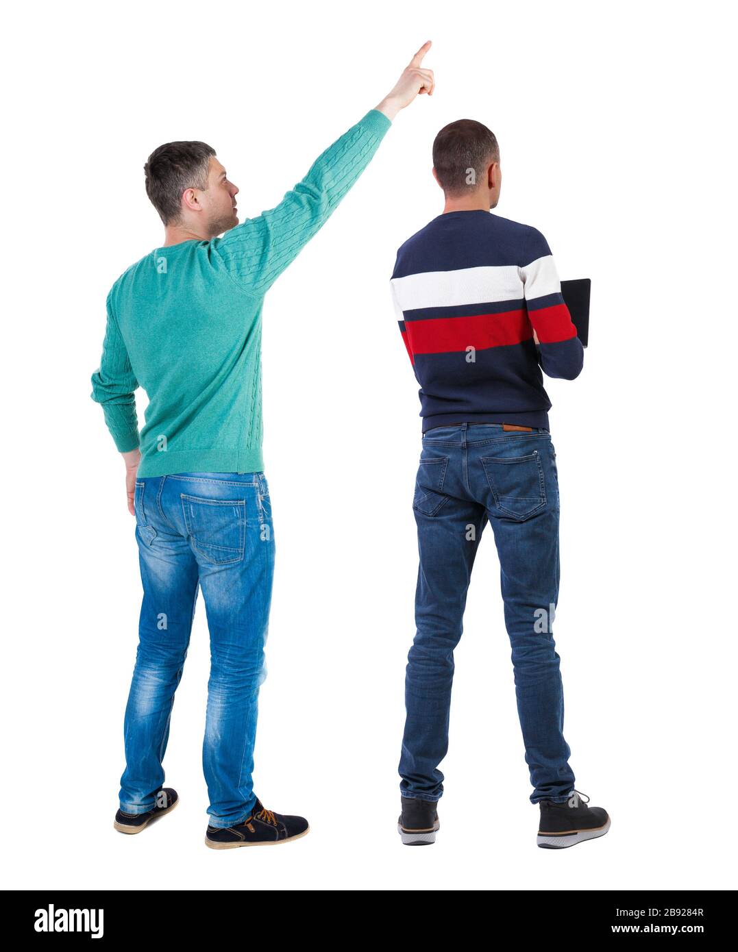 Back view of two man in sweater pointing. Rear view people collection ...