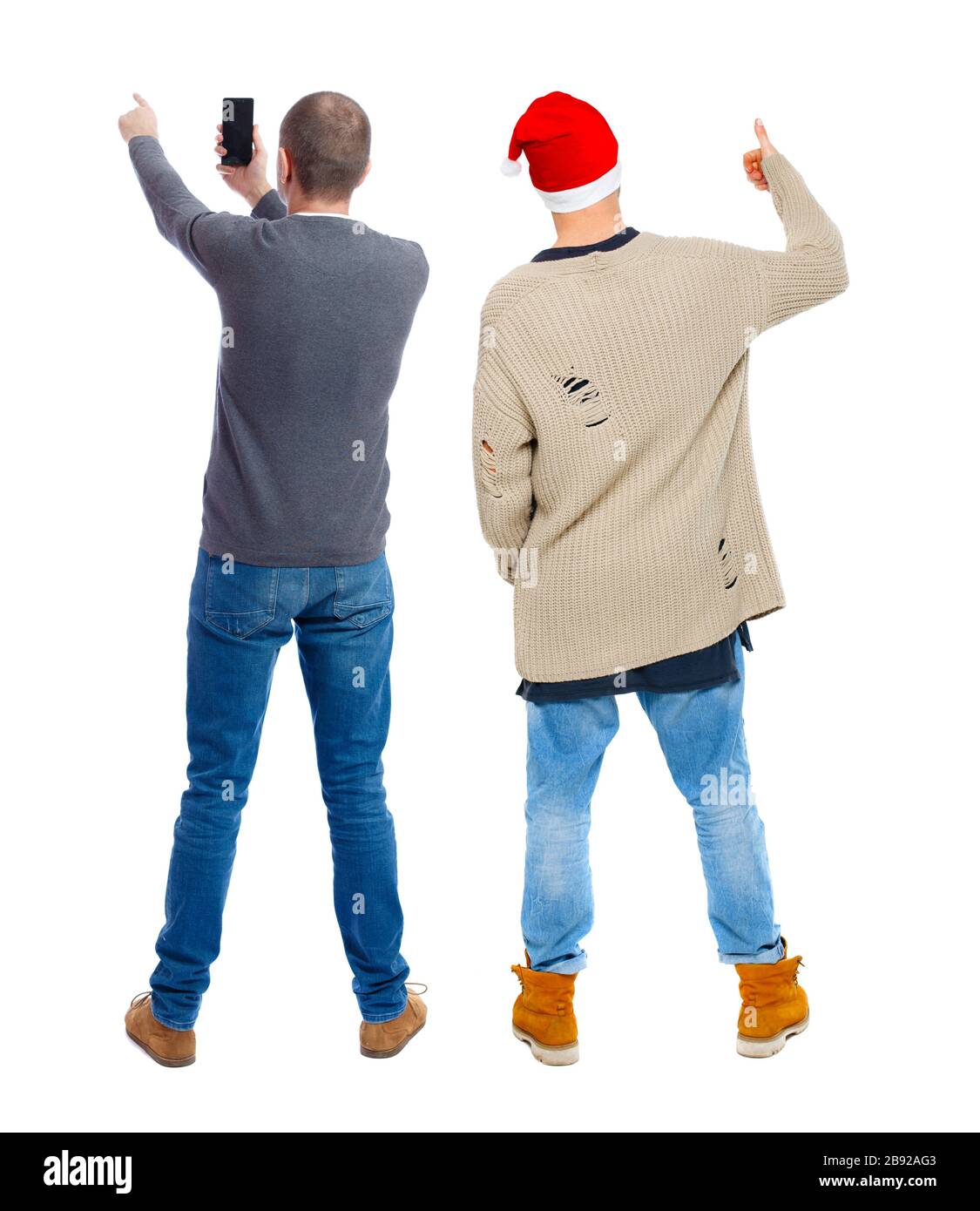 Back view of two man in sweater with mobile phone. Rear view people ...