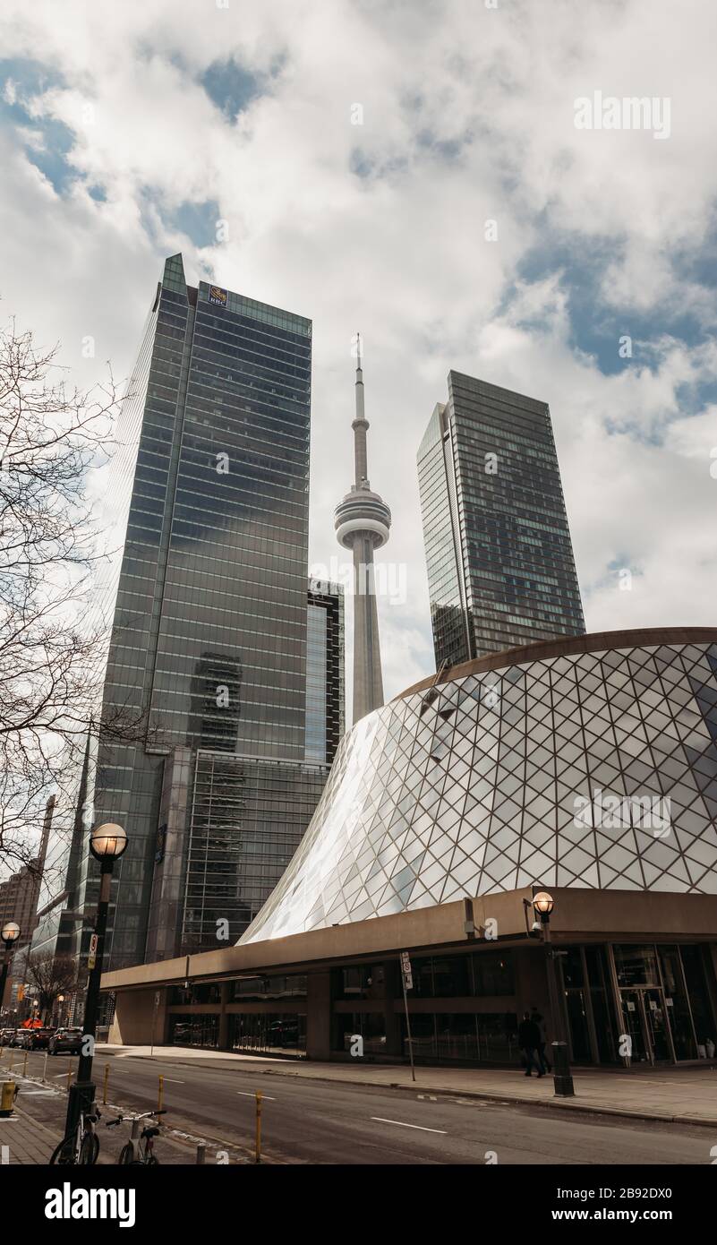 CN Tower between modern buildings in Toronto, Ontario, Canada Stock ...