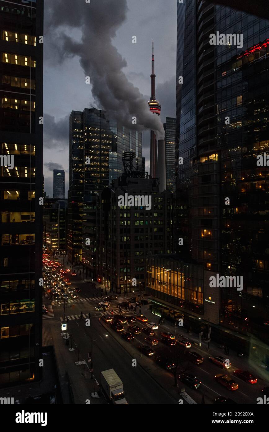 CN Tower, buildings and streets in downtown Toronto, Canada at night ...