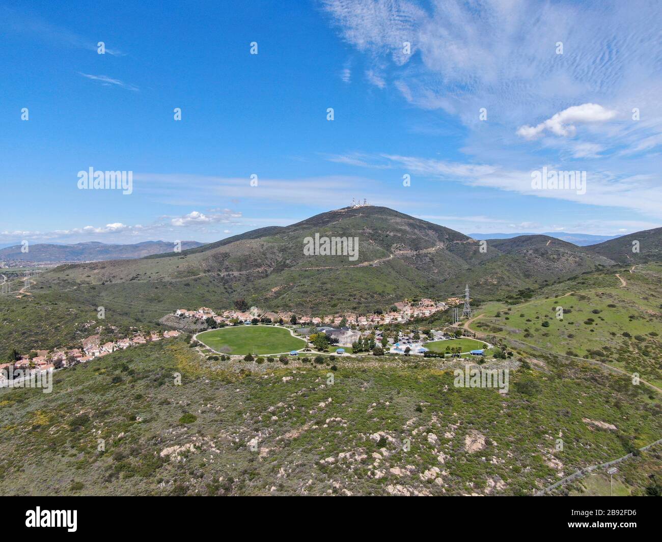 Aerial view of small community park with playground for kids in upper ...