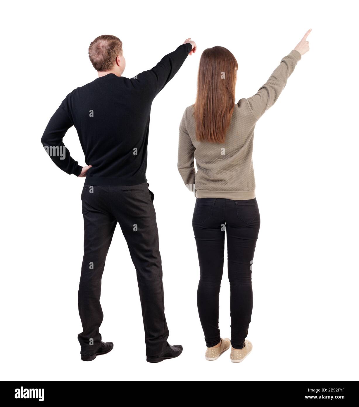 Back view of couple in sweater pointing. Rear view people collection ...