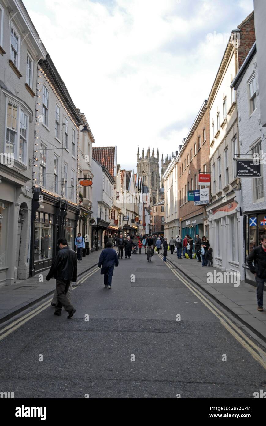 Low Petergate in the old quarter of the city of York, England. A number ...
