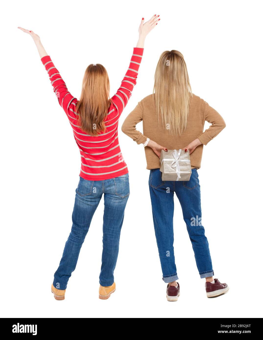 Back view of two woman in sweater. Rear view people collection ...