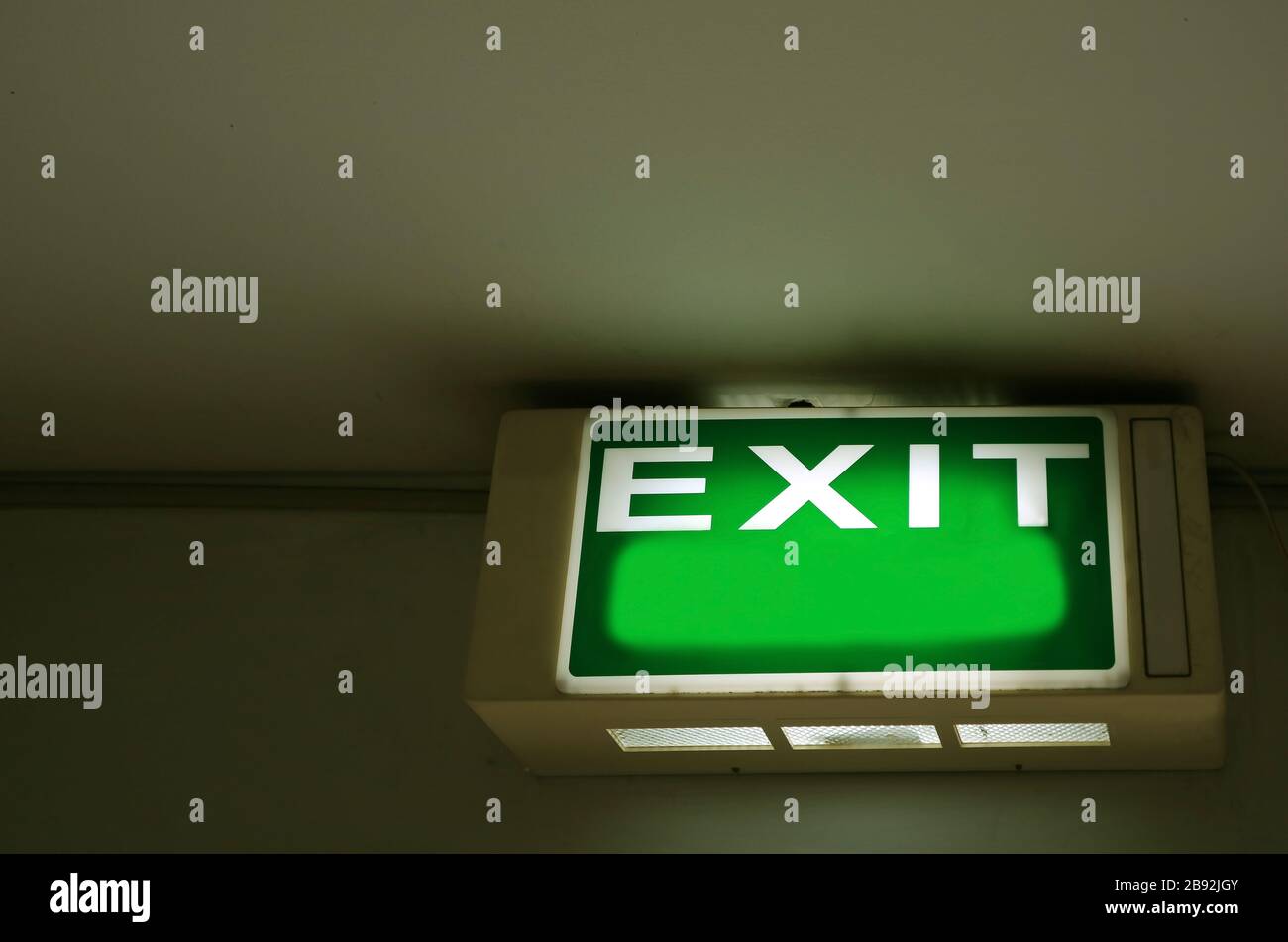 Exit sign hanging on ceiling hi-res stock photography and images - Alamy