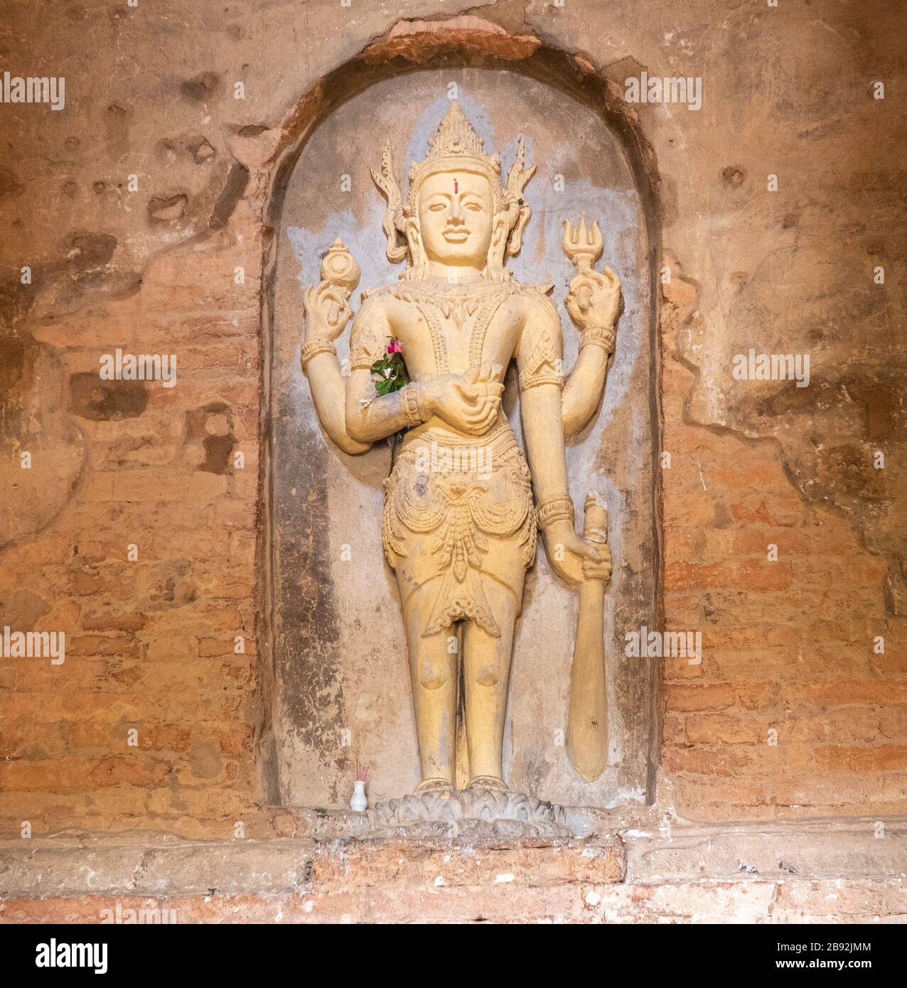 Buddha Statue inside old pagoda Bagan, Myanmar. Bagan is well known for ...