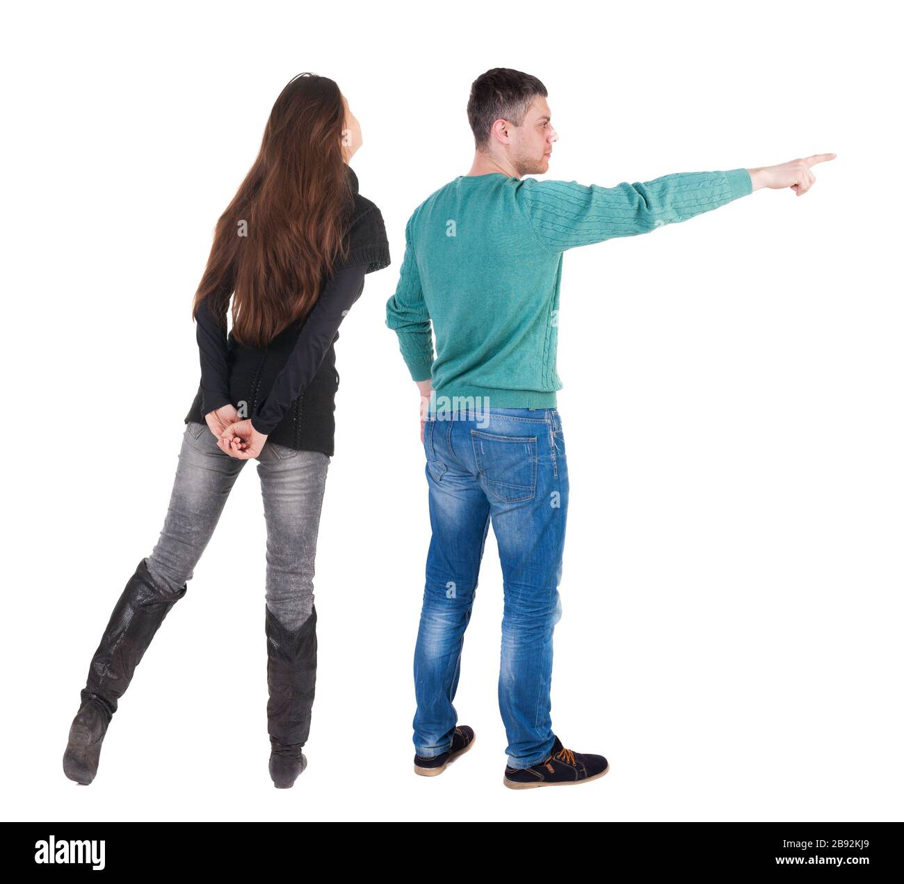 Back view of couple in sweater pointing. Rear view people collection ...