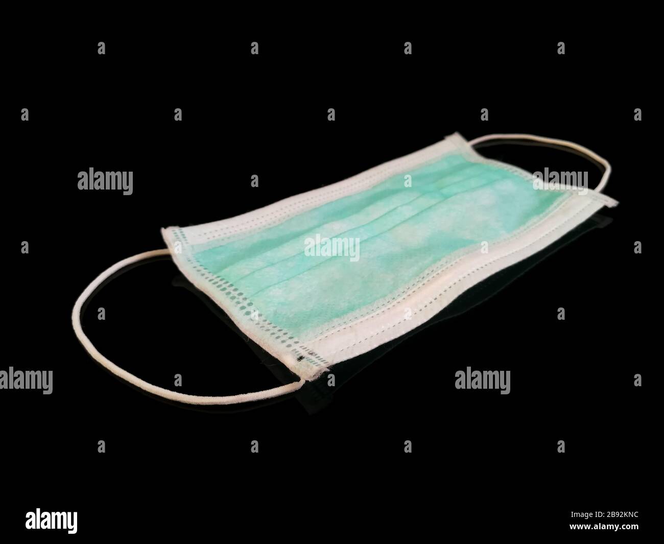 Disposable face mask for virus and bacteria protection isolated on the ...