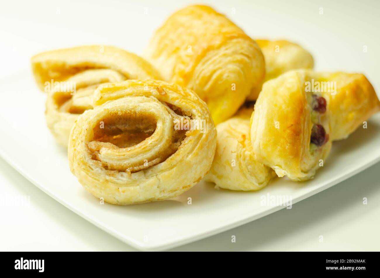 Set of various traditional pastry sweet mini Danish on the plate ...
