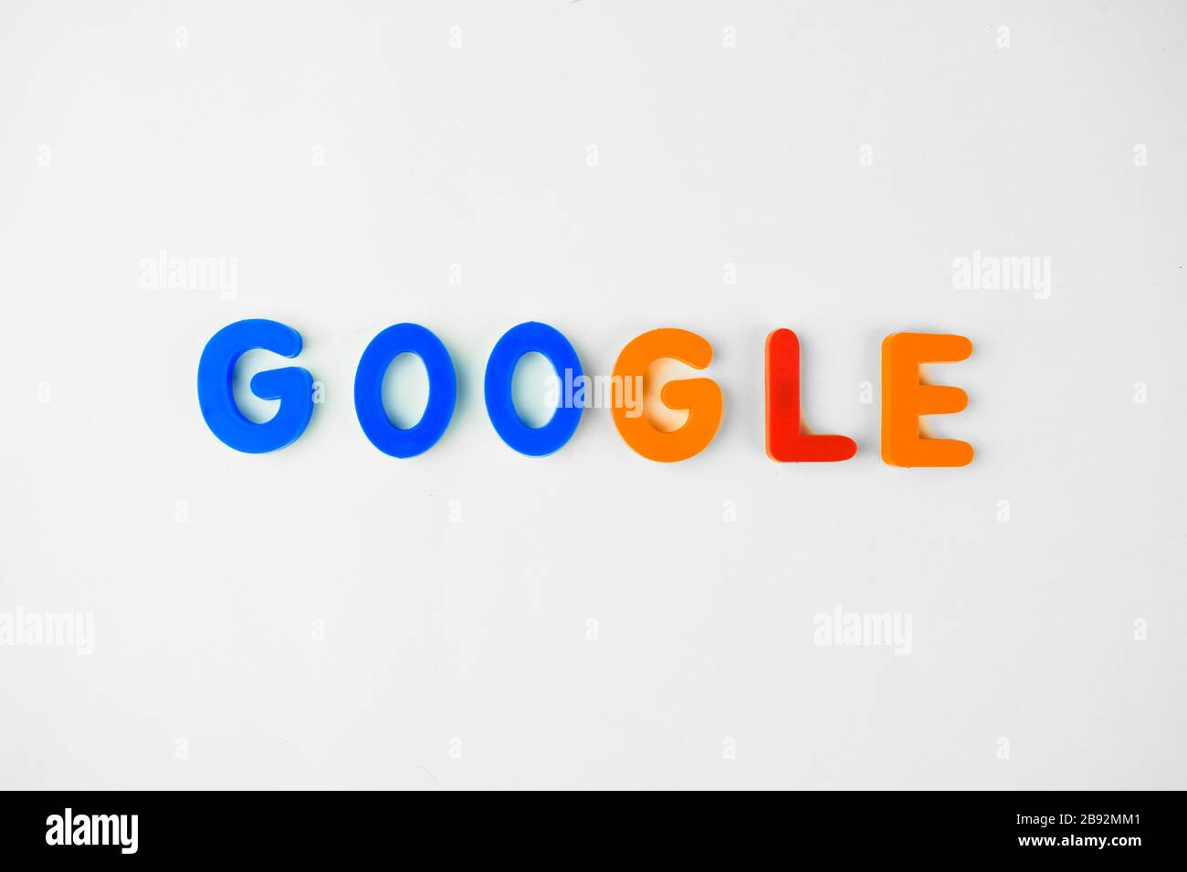 GOOGLE written in different colored letter blocks on an isolated white ...