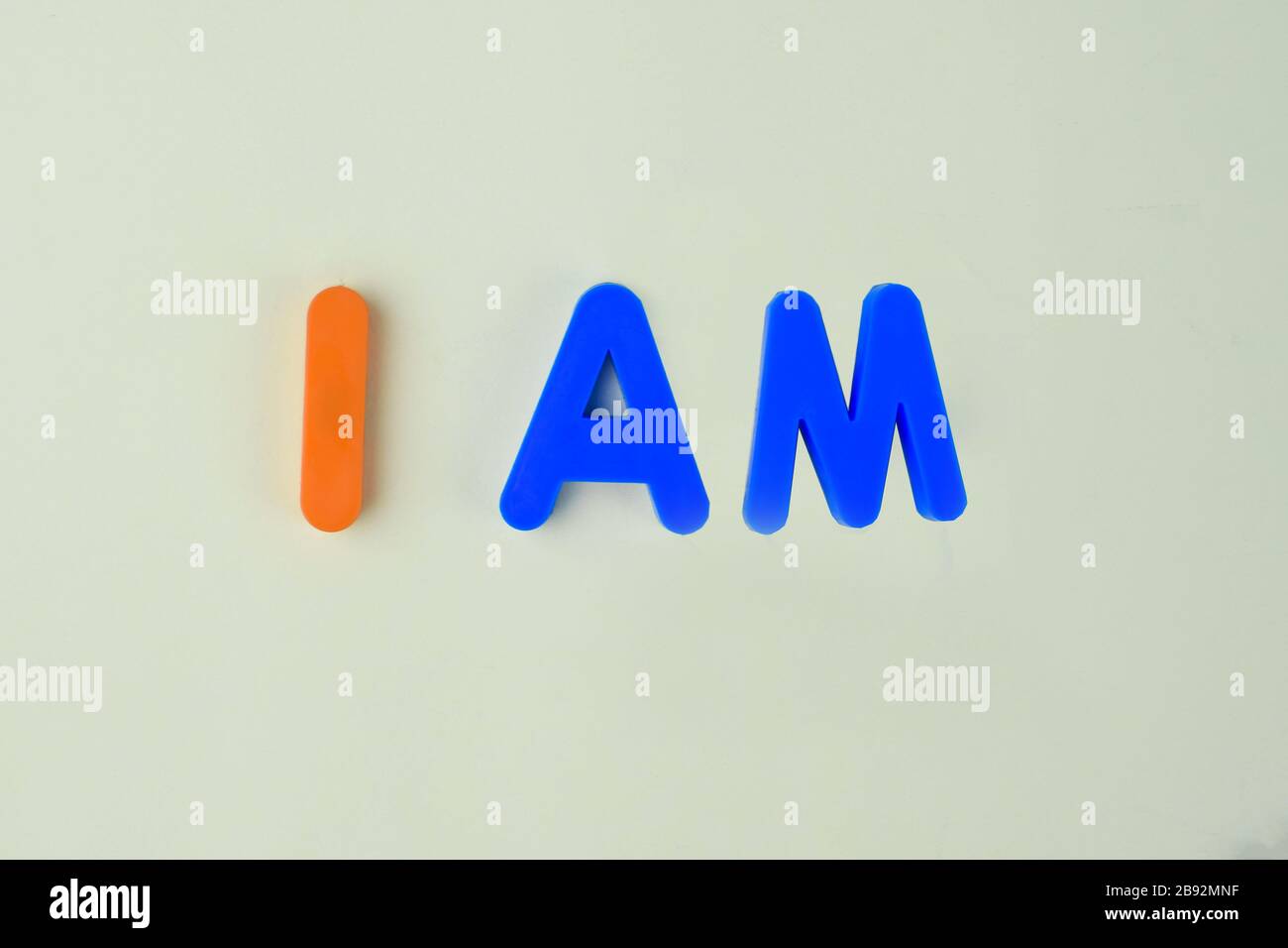 I AM which is written in different colored letter blocks on an isolated ...
