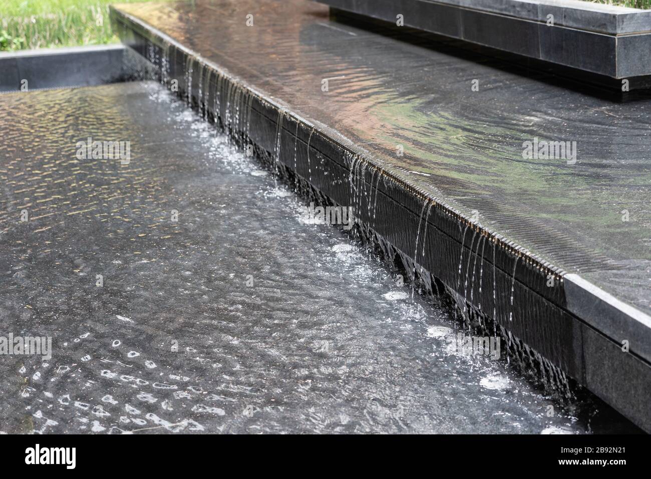 Small Cascade in the Open Air Courtyard. Water Feature as Part of ...