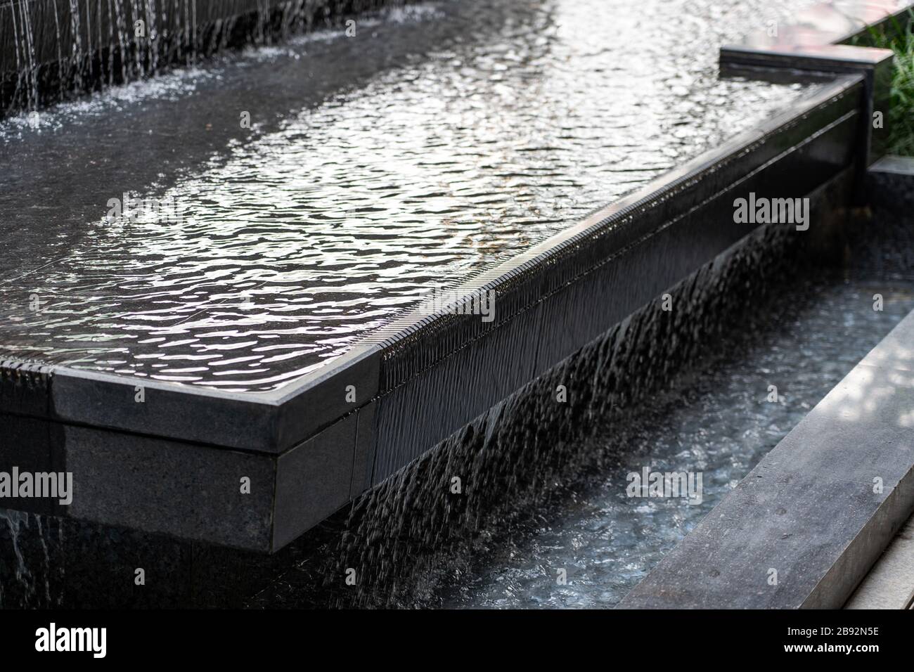Small Cascade in the Open Air Courtyard. Water Feature as Part of ...