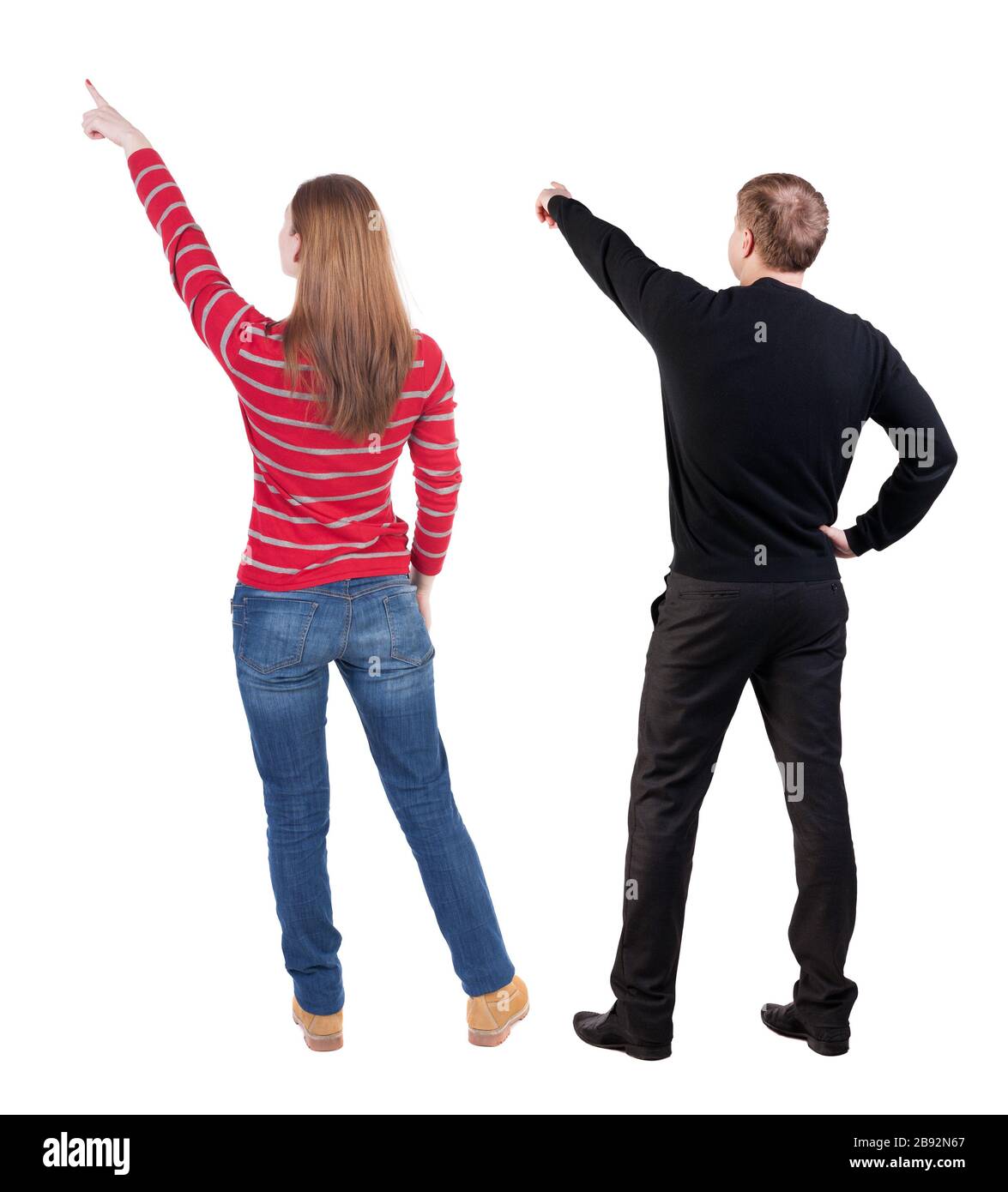 Back view of couple in sweater pointing. Rear view people collection ...