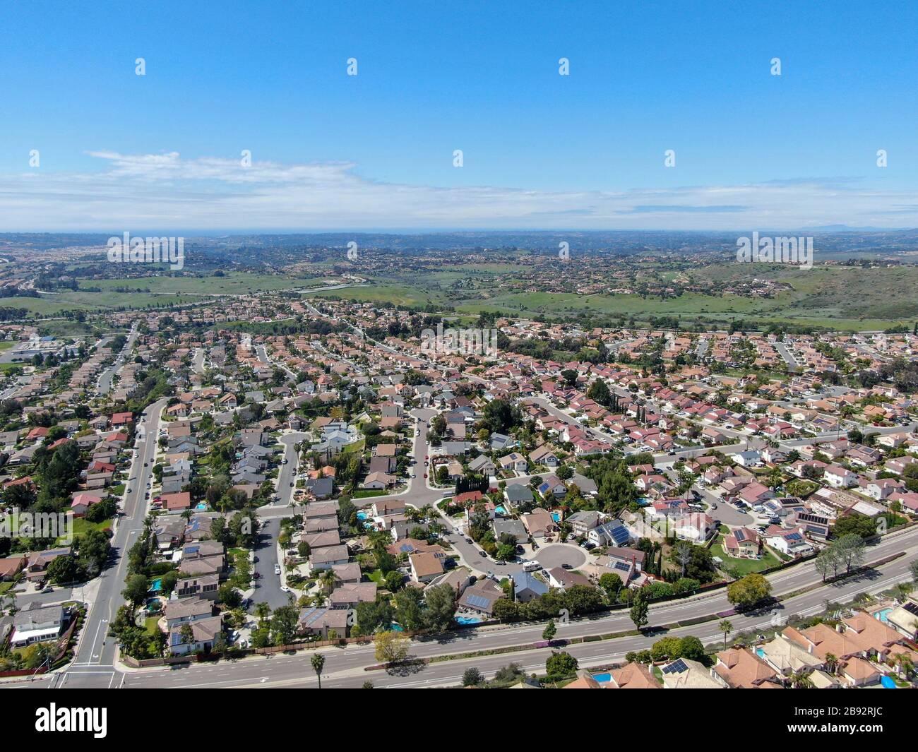 Aerial view of upper middle class neighborhood with residential ...