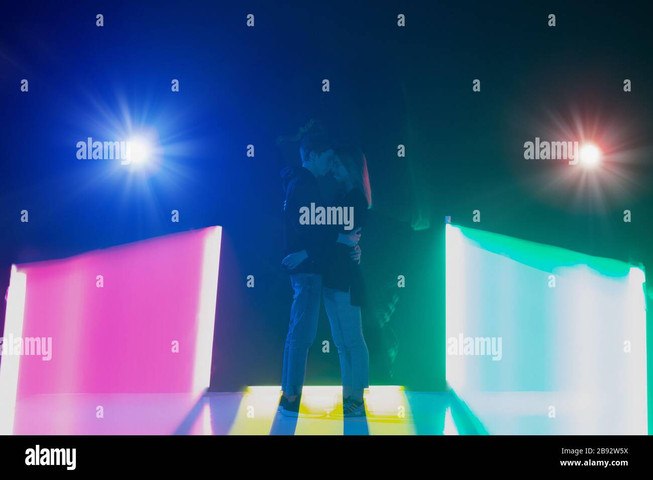 Couple Hugging In Nightclub High Resolution Stock Photography and ...