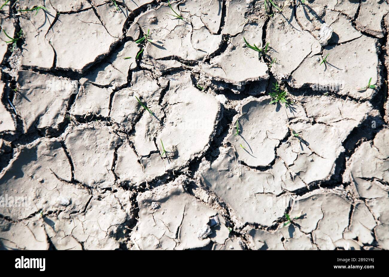 broken dry earth from above climate change Stock Photo - Alamy