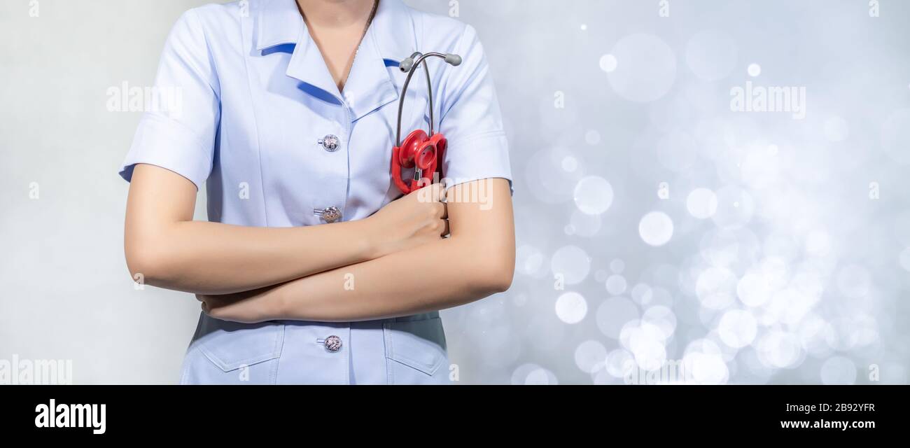 Female doctor with tools, white background Stock Photo - Alamy