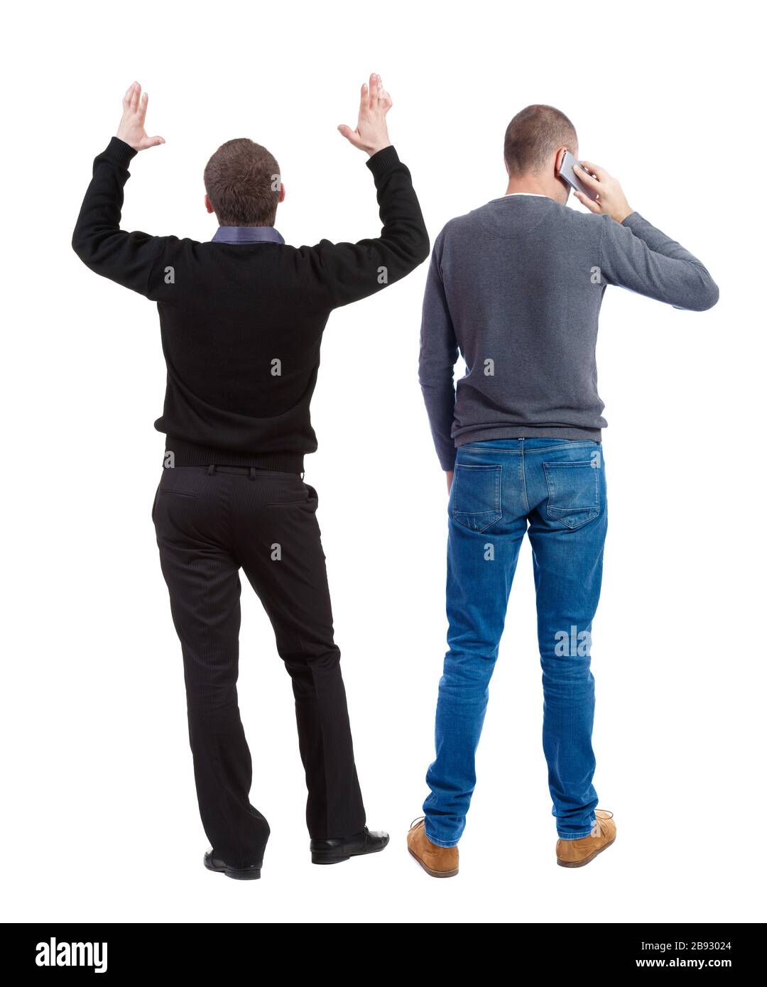 Back view of two man in sweater with mobile phone. Rear view people ...