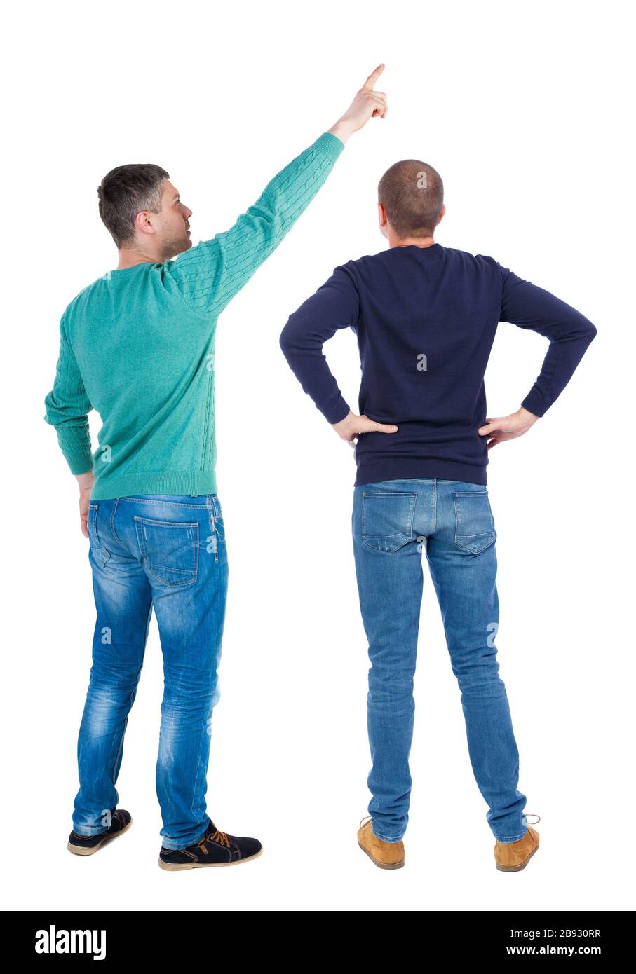 Back view of two man in sweater pointing. Rear view people collection ...