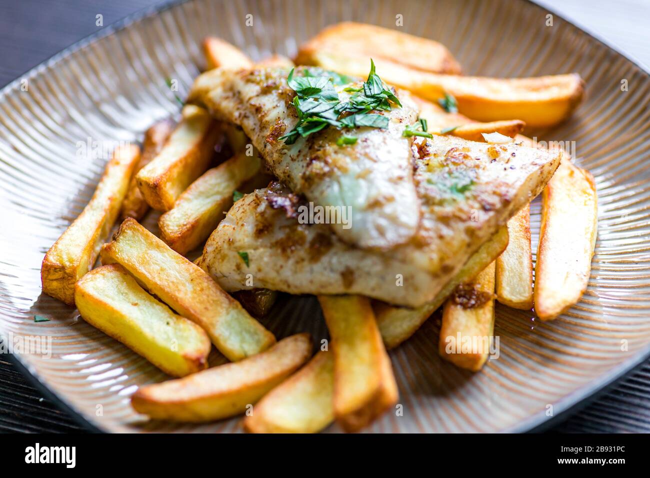 fried zander with homemade potato chips Stock Photo - Alamy